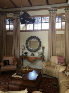 ideas to redesign room. 14 ft ceilings. Two walls floor to ceiling win