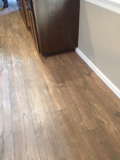 Our New Quick Step Reclaime Laminate Flooring (Mocha Oak Planks)