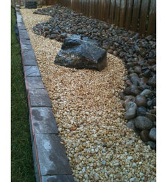 Hardscape ideas for dirt area of yard.