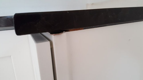 Granite counter installed with shims - problem?
