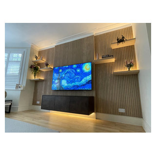 Floating tv unit with floating shelves wall panelling - Mediterranean ...