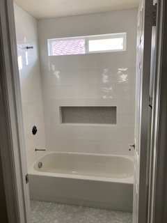 How do I lay a 8”x24” tile in shower?
