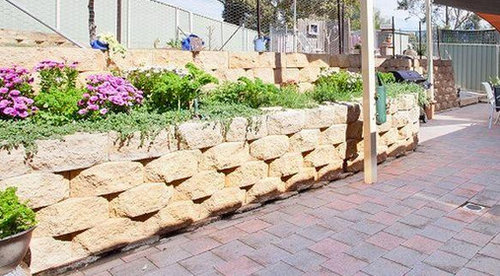 Pour concrete over the stone retaining wall? | Houzz AU