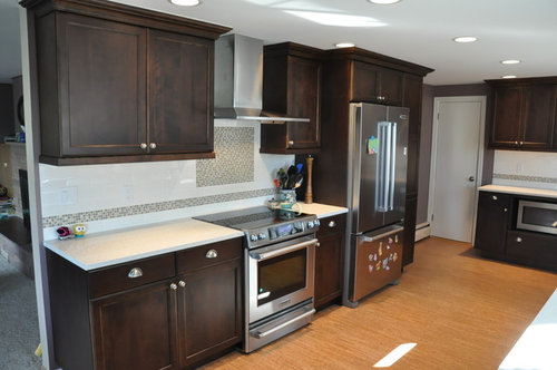 Fix a chopped up kitchen space into a dream kitchen for a family.