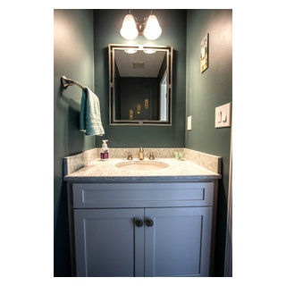 Green Powder Room with White Vanity and Beige and Green Countertop ...