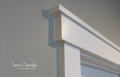 Fluted door and window trim with rosettes