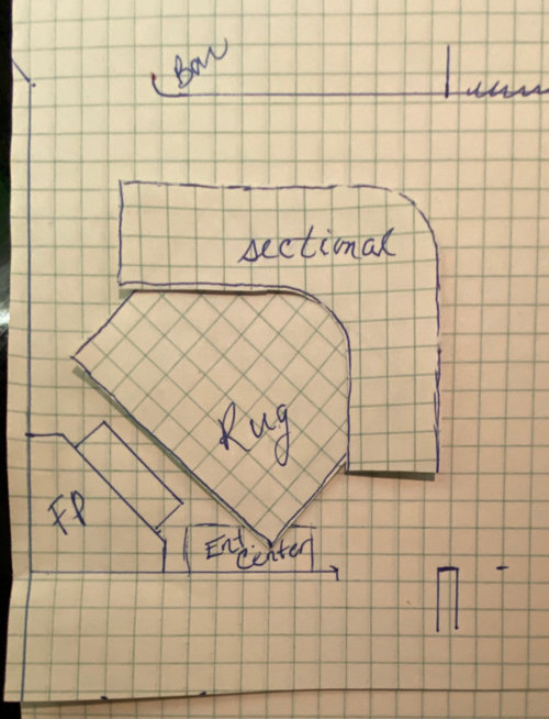 rug placement with diagonal fireplace