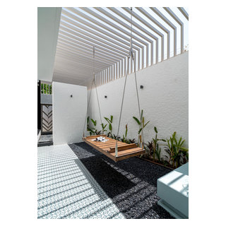 Semi-covered space adjoining the son's bedroom in the south-west corner ...