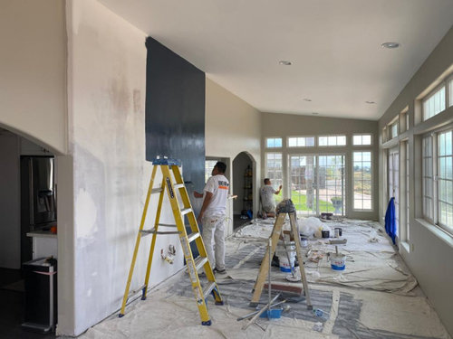 How to split paint colors between two rooms that share an open doorway