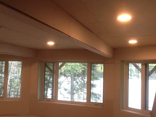 How should the beams be painted?