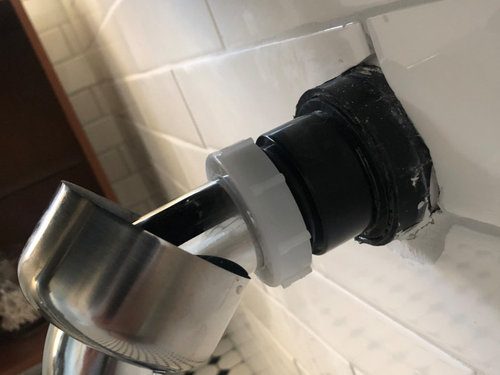 Escutcheon under bathroom sink