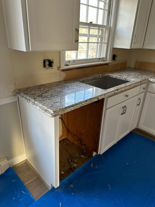 Alpine Valley countertops, off white cabinets.