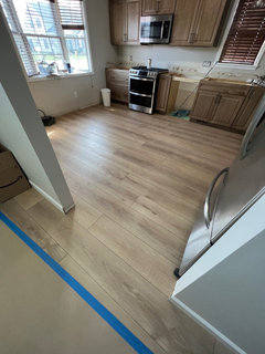 Flooring ideas Schuler cabinet in cappuccino on cherry