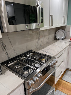 Quartz mitered edge and backsplash