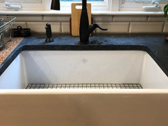 Pulldown faucet weight hits sink