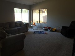 Off center couch in front of window -help?