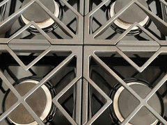 How can I clean GE monogram cooktop?