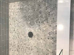 Marble tile discoloration in shower