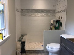 Help with shower glass enclosure and shower bench overhang?