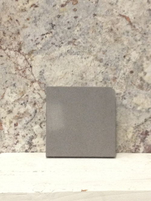 Spring White Leathered Granite with Ceasarstone Raven
