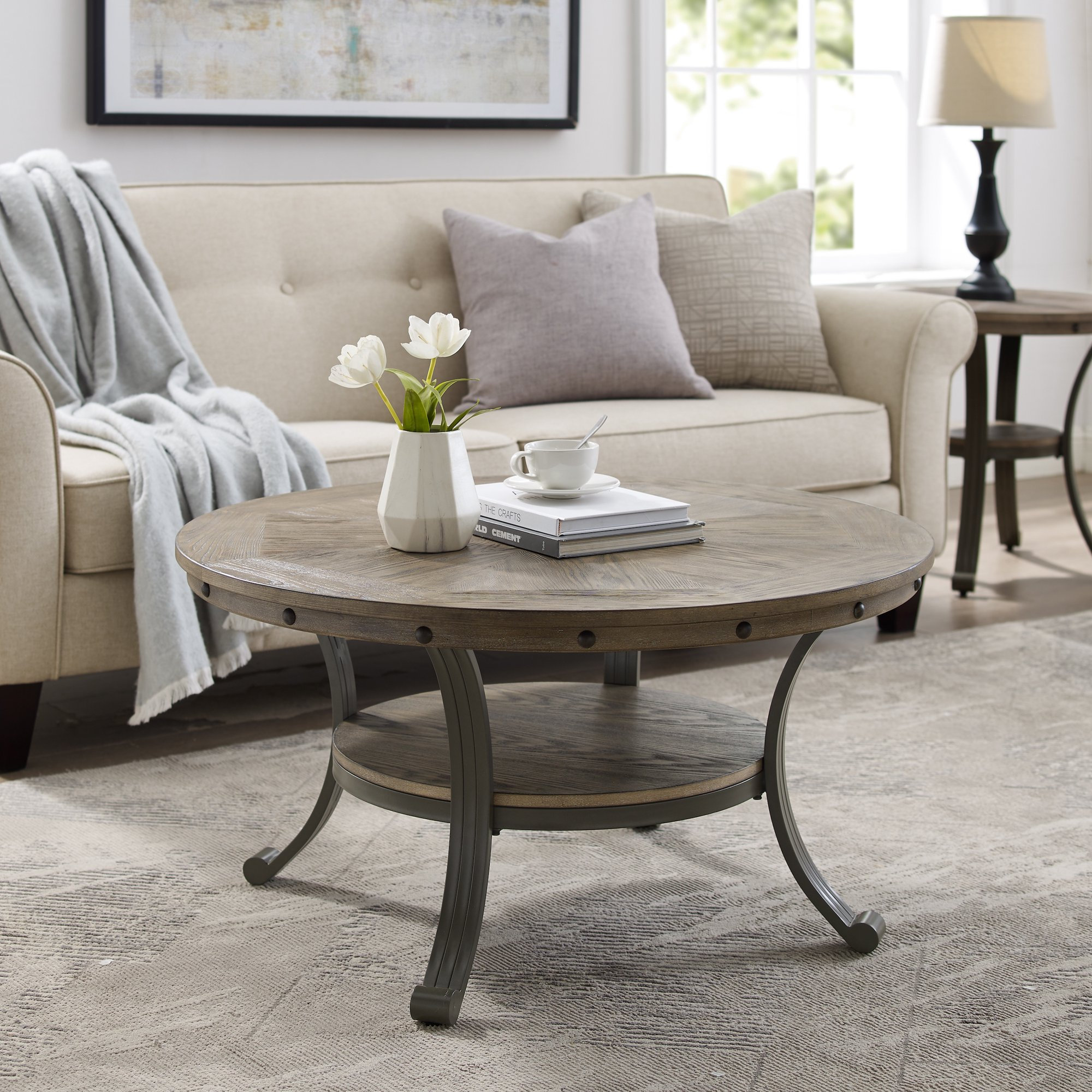 Industrial Round Coffee Table with Curved Legs and Nailhead Trim ...