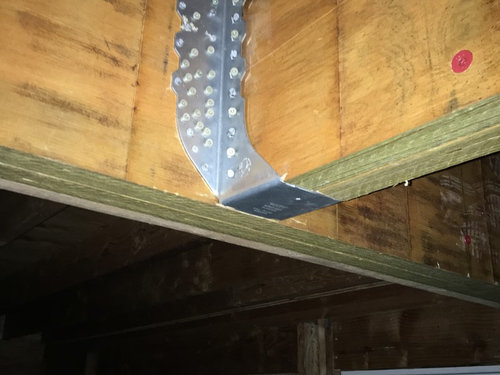 Structural connector used on load bearing beam