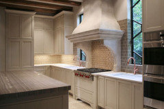 quartzite wrapped range hood?