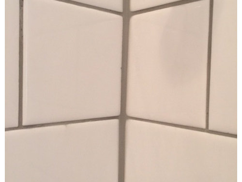 Is this a bad tile install? Any hope of fixing?