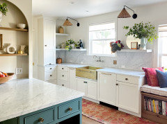 quartz floating shelf along one entire wall in kitchen