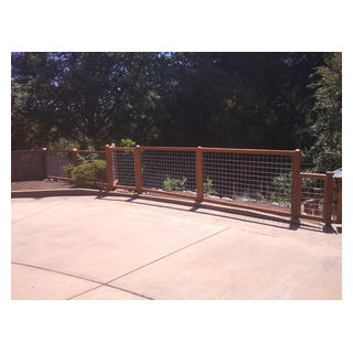 Terraced rock walls and hog wire fence - Rustic - Seattle - by Erin ...