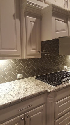 Backsplash recommendations for black fantasy leathered granite?