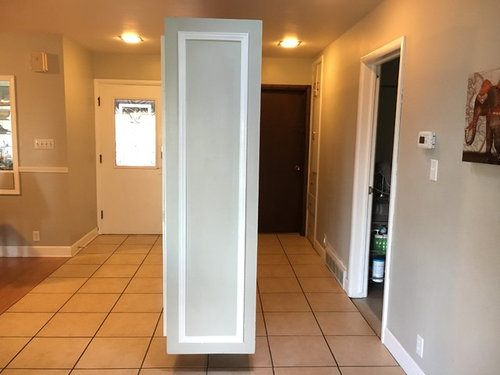 I need ideas for this awkward entryway