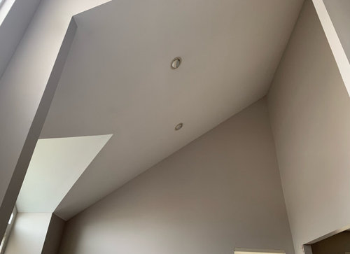 Light fixture for a slanted high ceiling