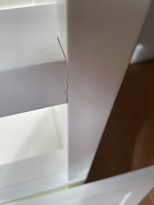 Should I accept those defects on the new kitchen cabinets?