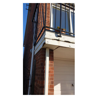 Front exterior - garage door, hand rail, and railing in West Wimbledon ...