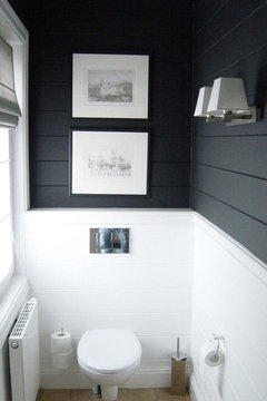 Navy walls for a windowless powder room