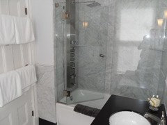 Need advice on marble or tile shower splash guards