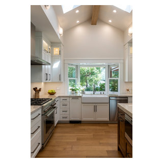 Vaulted Kitchen Ceiling with Recessed Lighting and Exposed Beam ...