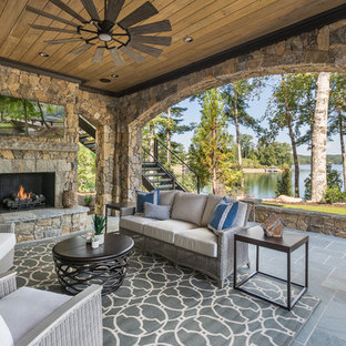 75 Most Popular Rustic Veranda with a Fireplace Design Ideas for July ...