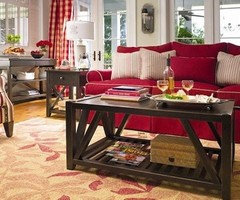 How do I use a red traditional sofa in a neutral room?