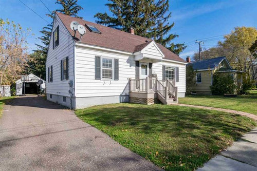 boring 1950s cape - black windows?