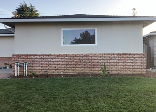 The bricking area that goes halfway on exterior called?