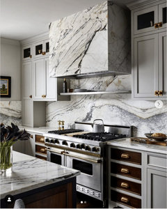 quartzite wrapped range hood?