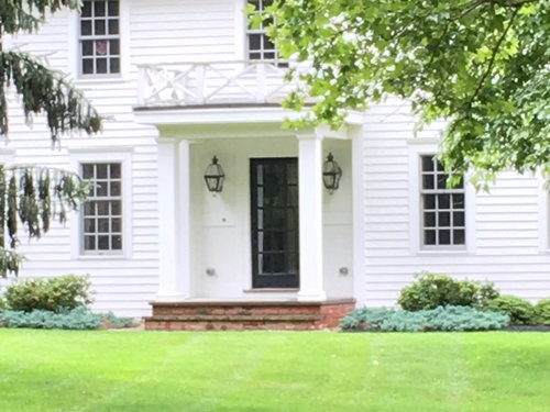 Portico design for a traditional colonial, with recessed door