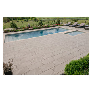 Contemporary Outdoor Pool and Covered Patio Using Porcea Creek ...