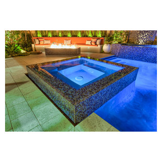 Contemporary Backyard Pool with Tiled Water Feature, Rim Flow Spa ...
