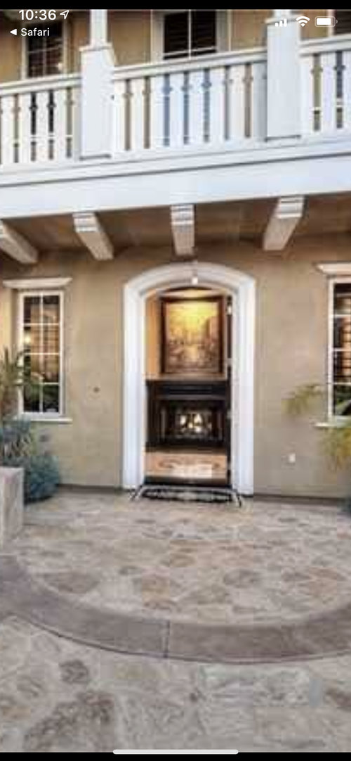 Fireplace faces front door within 5 feet