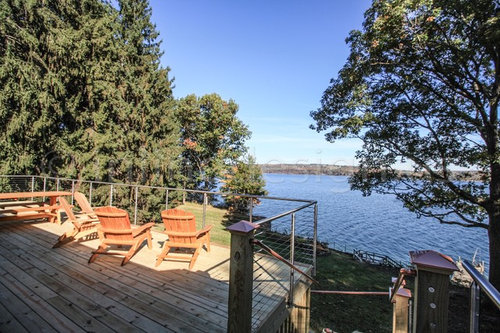 Amazing waterfront deck build with cable railing!