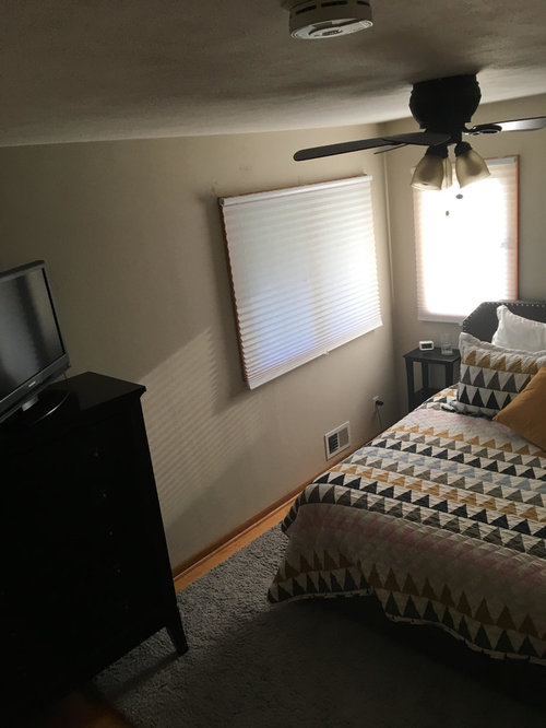 Bedroom with too many doors and off centered windows??