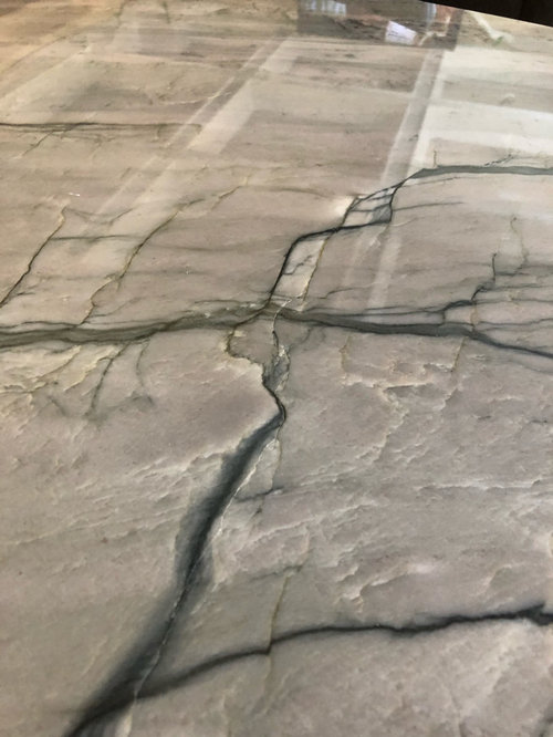 Newly installed granite crack vs fissure?